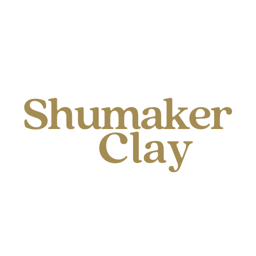 Shumaker Clay logo